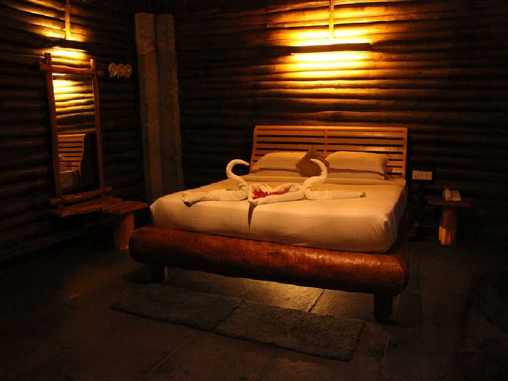 Wooden Cottage – MangoMist Resort Bangalore
